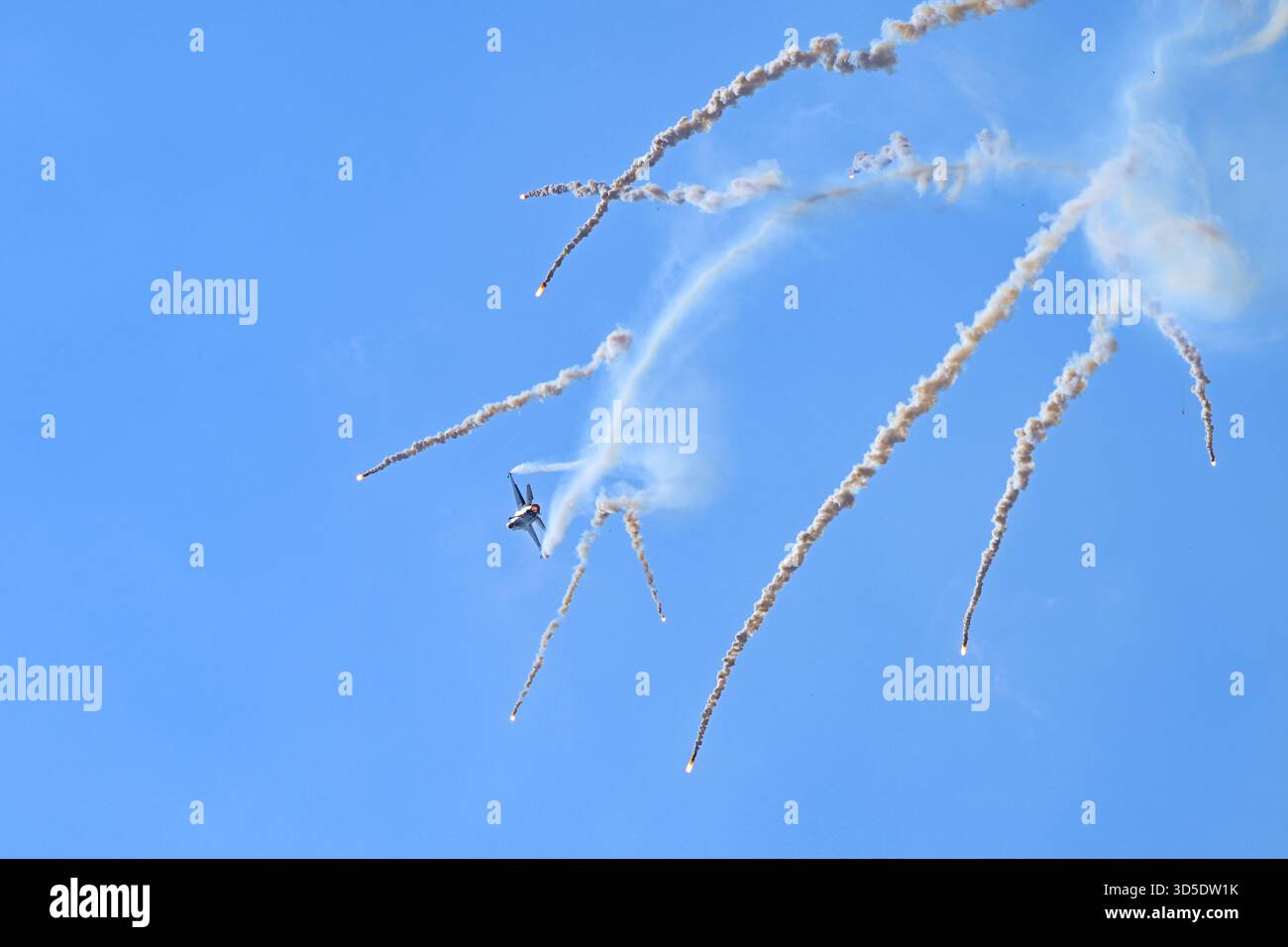 Turkish Air Force F-16 Deploying Flares. A powerful jet fighter ...