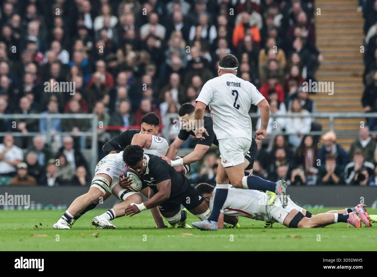 Peter Lakai New Zealand is tackled by Sam Underhill of England during ...