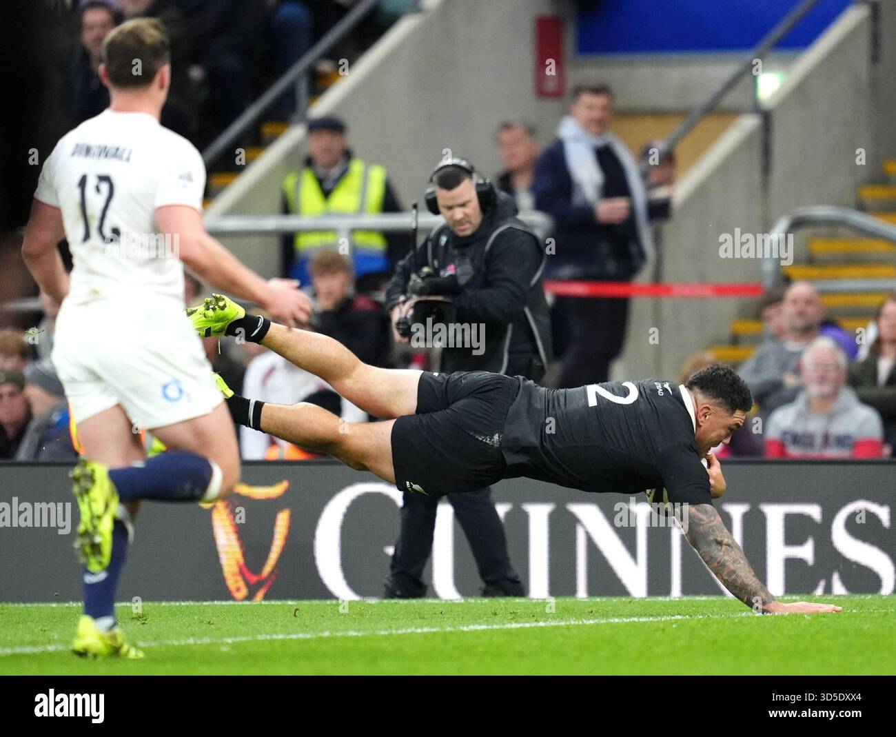 New Zealand's Codie Taylor scores their side's second try of the game ...