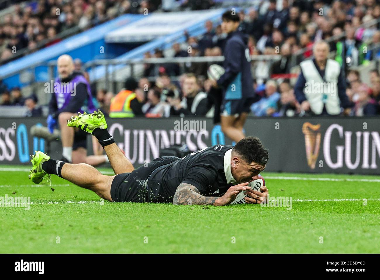 Codie Taylor of New Zealand goes over for a try during the Quilter ...