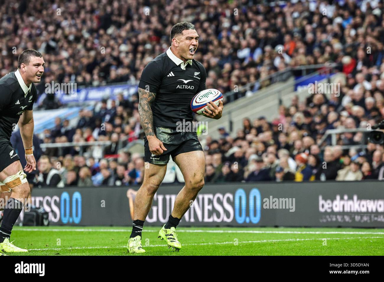 Codie Taylor of New Zealand celebrates his try during the Quilter ...