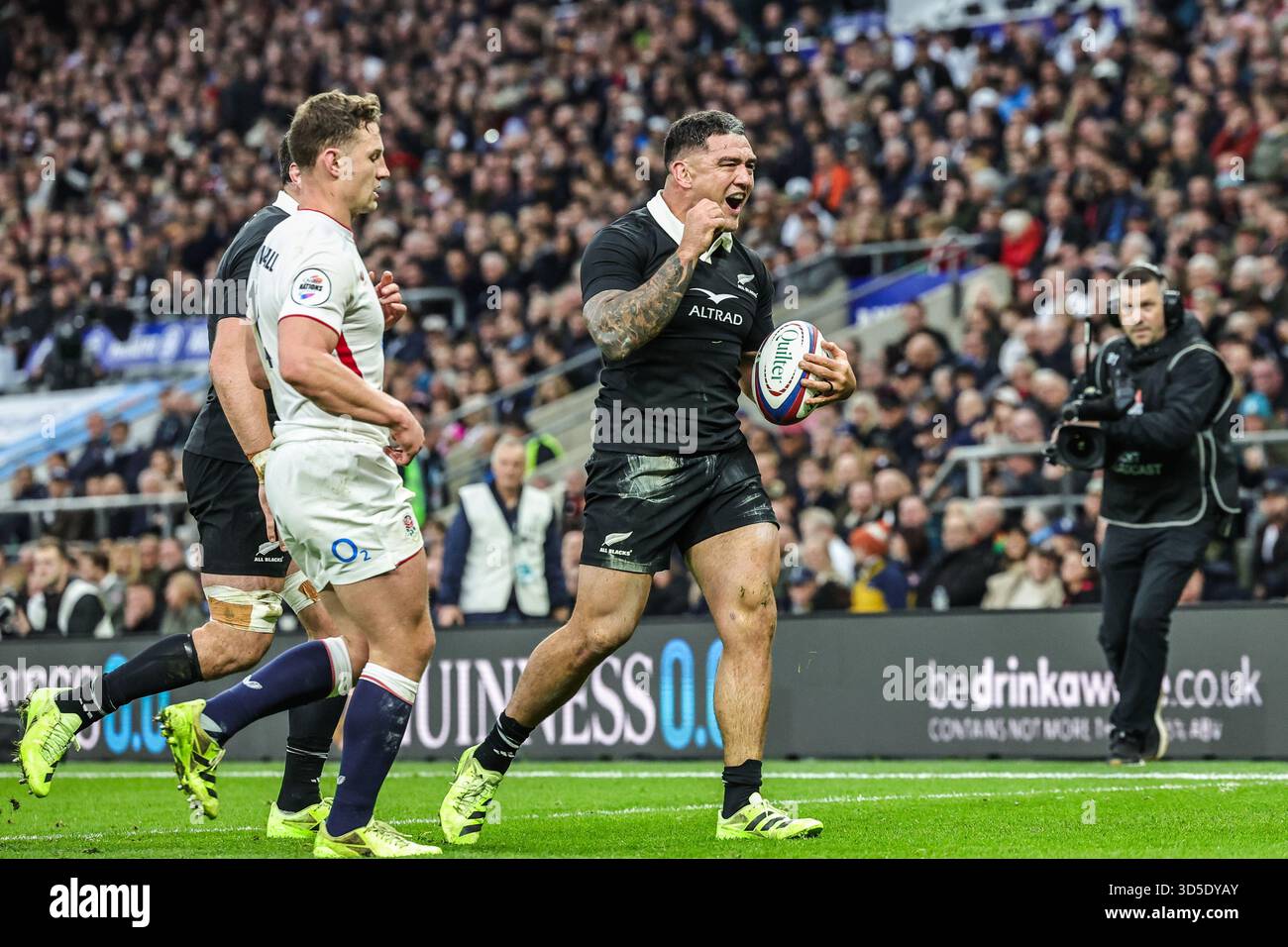 Codie Taylor of New Zealand celebrates his try during the Quilter ...