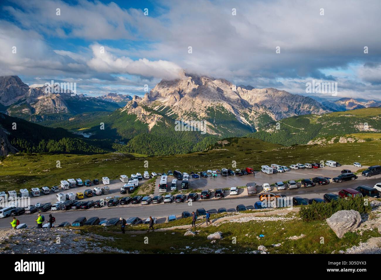 Cars parked at Rifugio Auronzo for tourists hiking the circular route ...