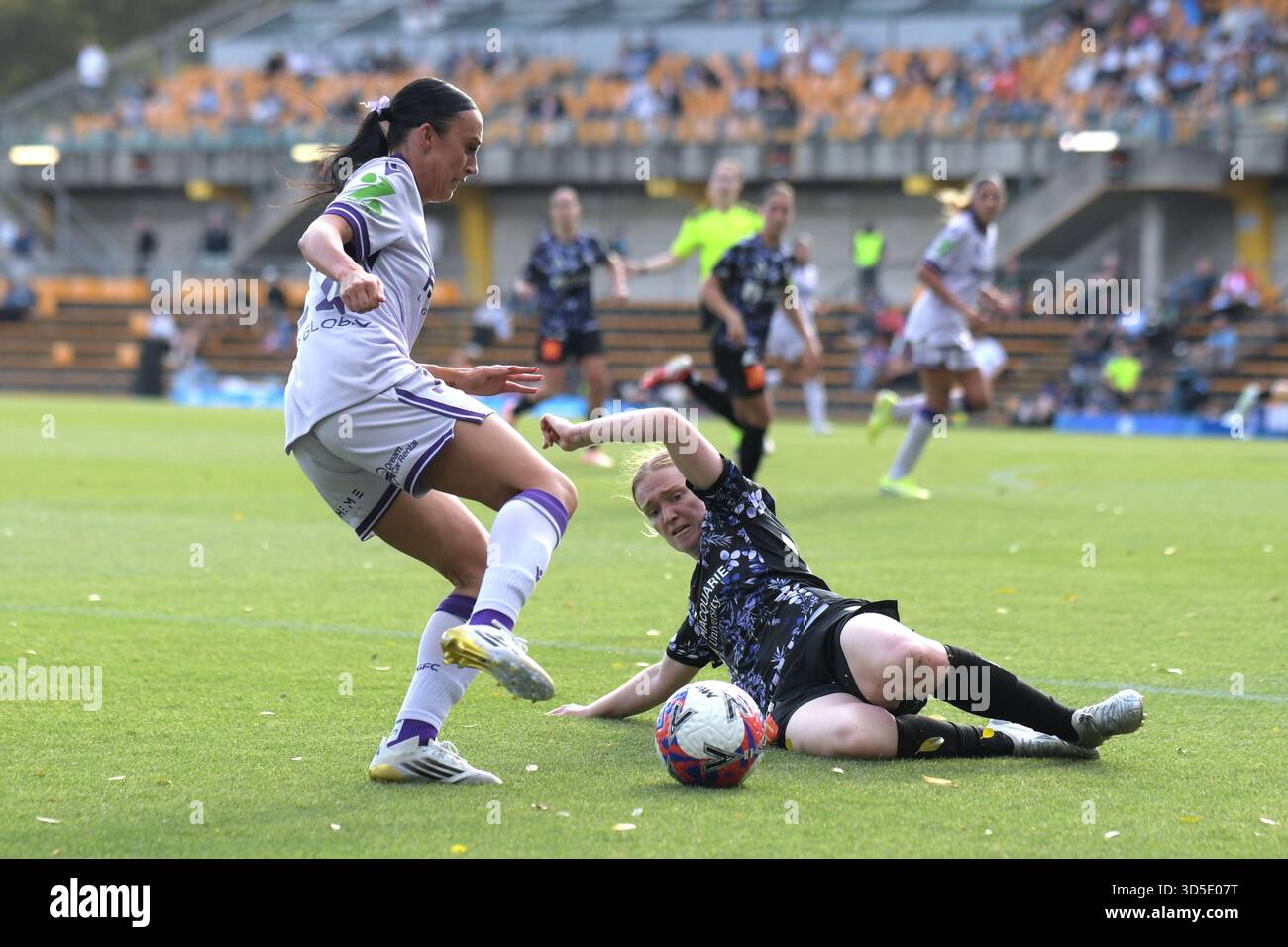 Bronte Trew (L) of Perth Glory and Abbey Lemon (R) of Sydney FC seen in ...