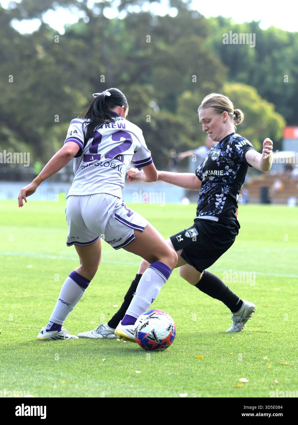 Bronte Trew (L) of Perth Glory and Abbey Lemon (R) of Sydney FC seen in ...