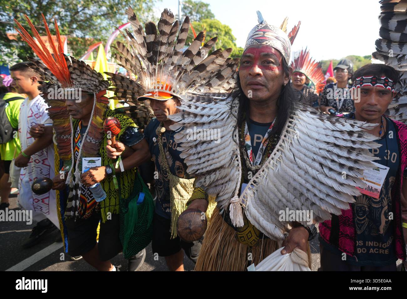 Indigenous activists participate in a climate protest during the COP30 ...