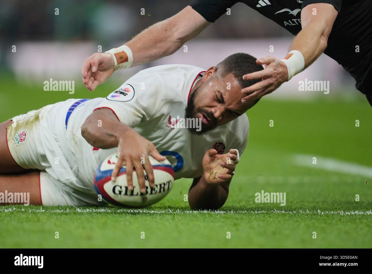 England Ollie Lawrence scores a try during the rugby union Nations ...