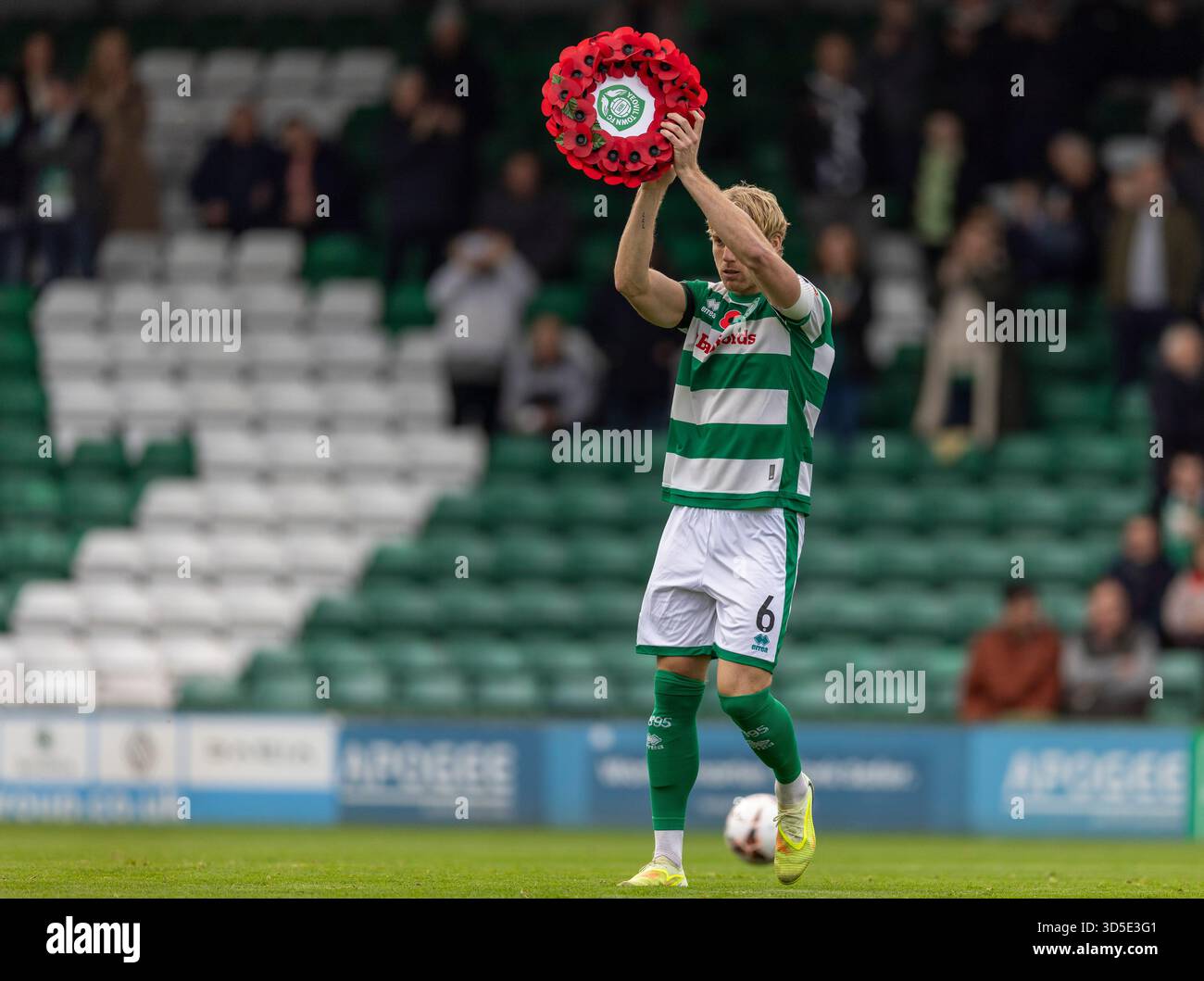 Yeovil Town's Jake Wannell with wreath applauds crowd Enterprise ...