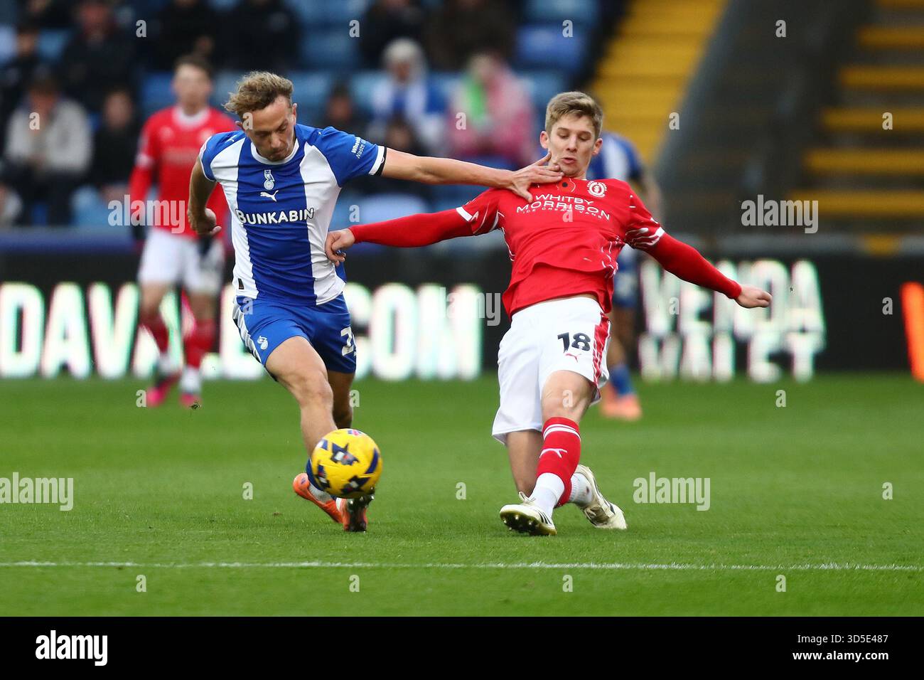 James Connolly of Crewe Alexandra battles with Michael Mellon of Oldham ...