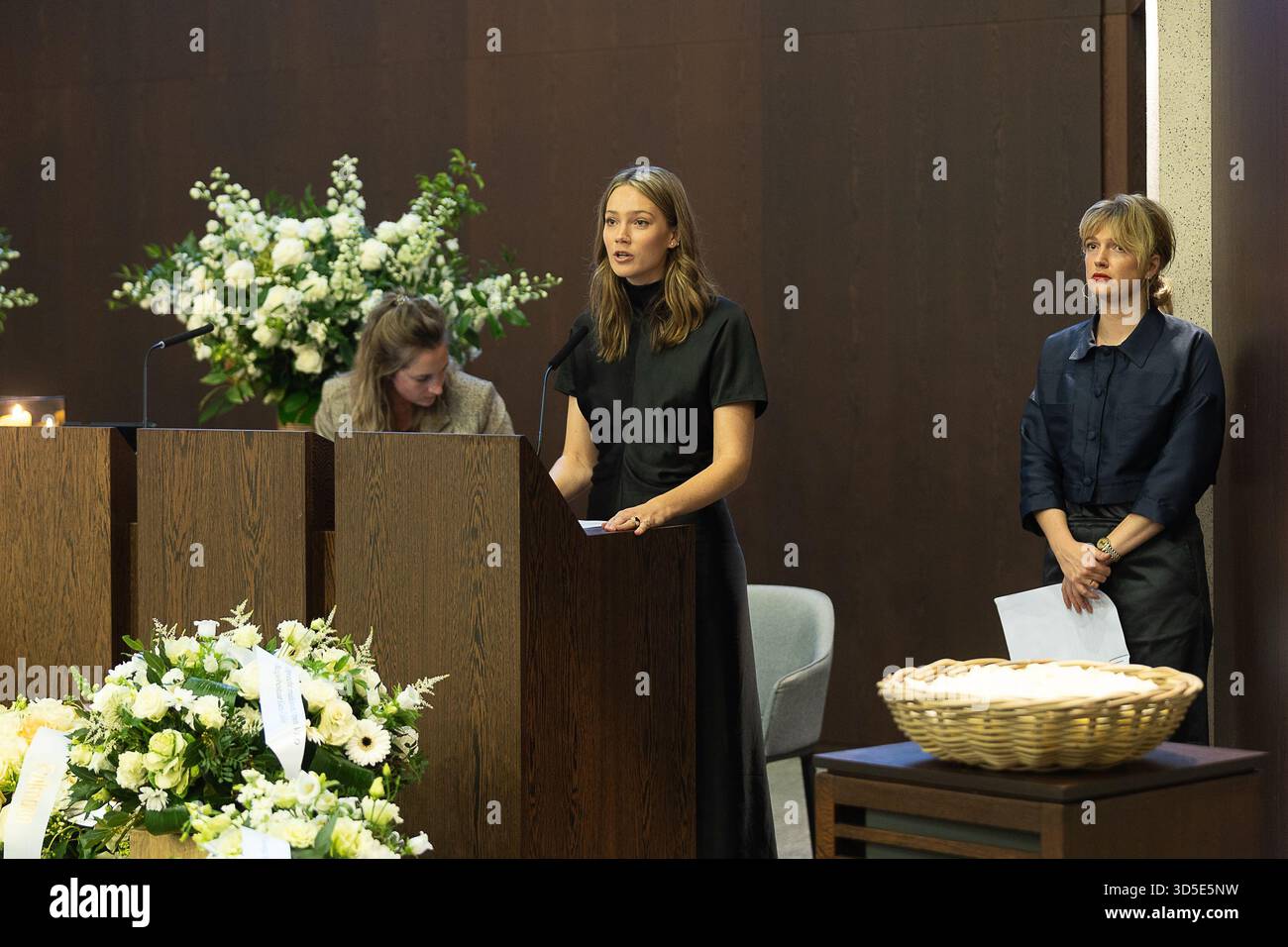 Daughters Lauren and Morgane pictured during the funeral ceremony for ...