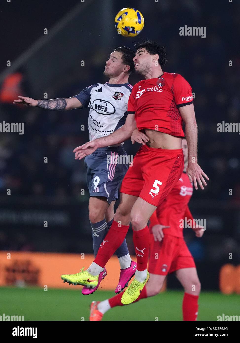 Exeter City's Jayden Wareham (left) and Leyton Orient's Dan Happe ...
