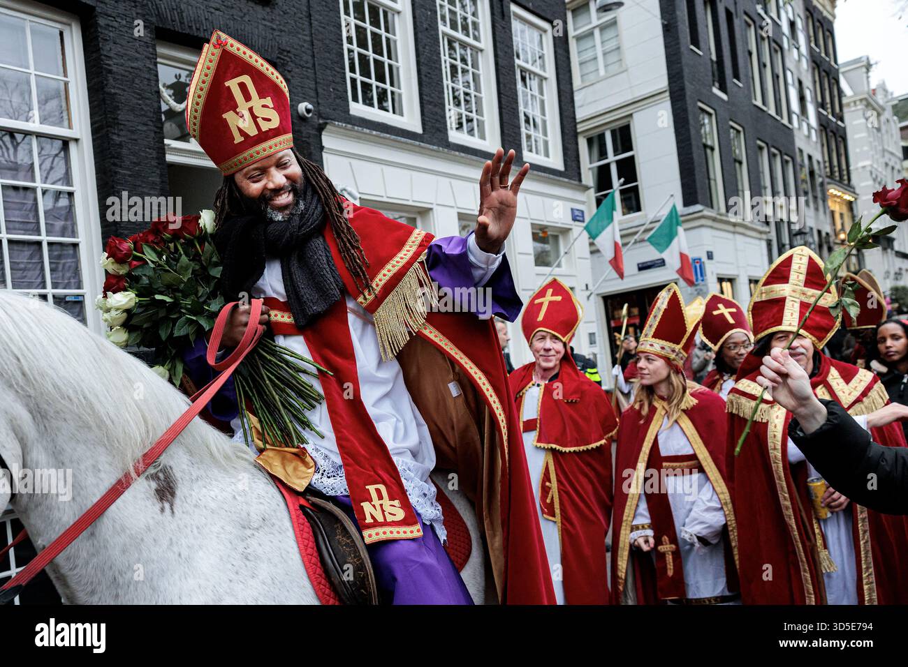 AMSTERDAM - The New Saint with roses and a brass band during a ...
