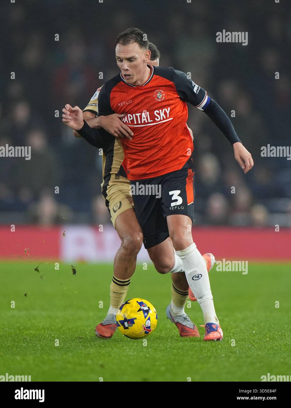Luton Town's Kal Naismith and Rotherham United's Shaun McWilliams ...