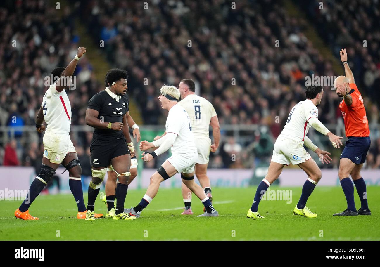 England's Henry Pollock (centre) celebrates a turnover during the ...