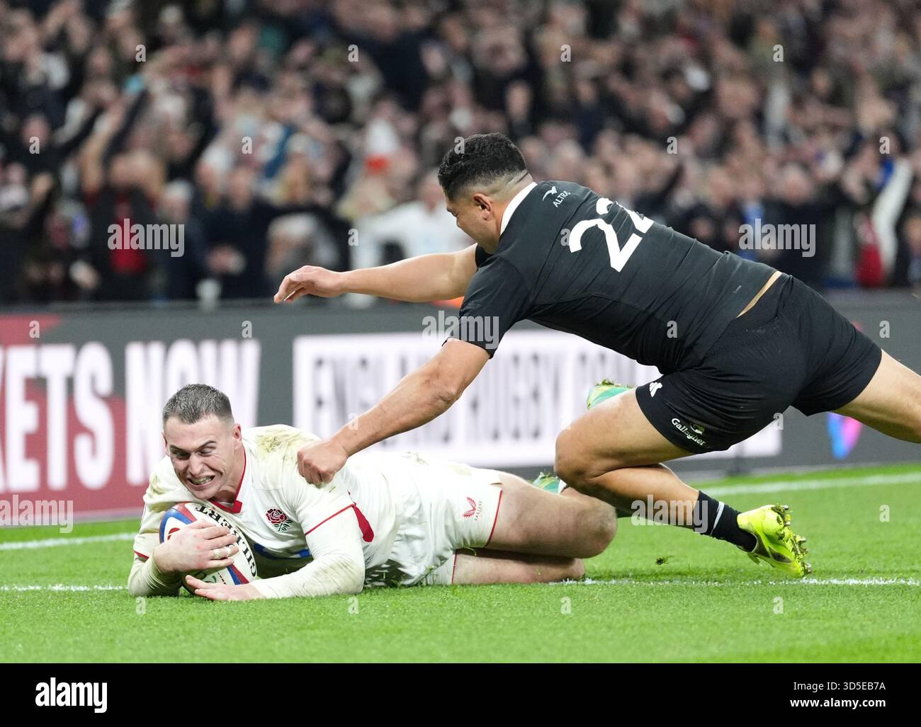 England's Tom Roebuck scores their side's fourth try of the game during ...