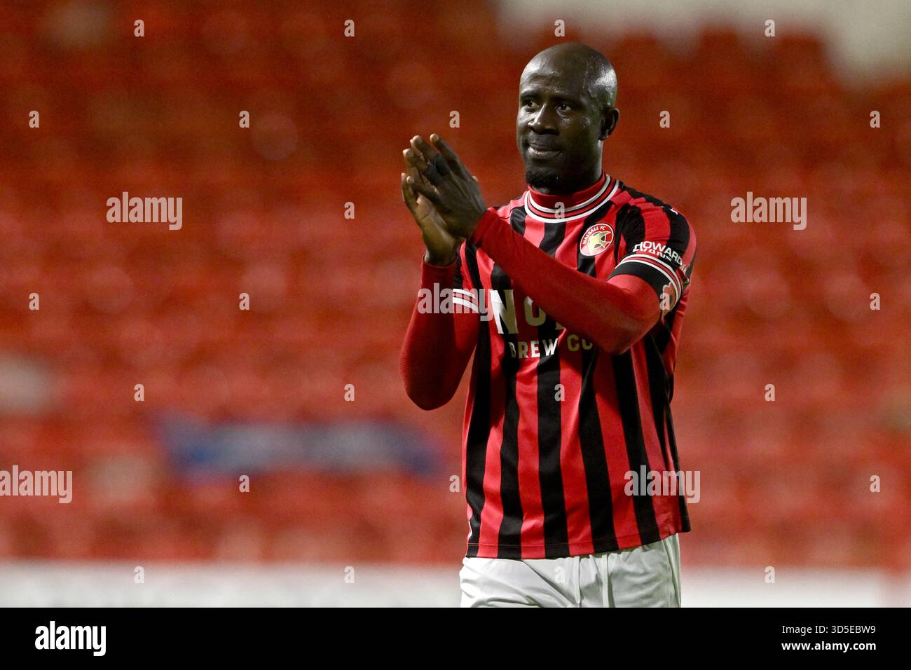Walsall's Albert Adomah applauds the fans after the final whistle of ...