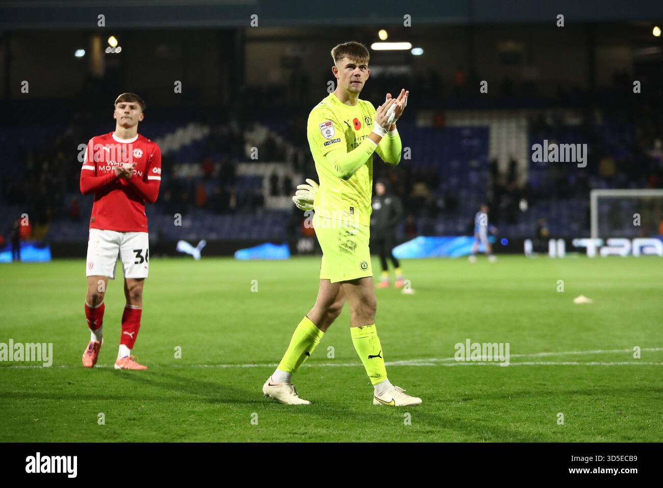 Tom Booth, Goalkeeper of Crewe Alexandra applauds the fans during the ...