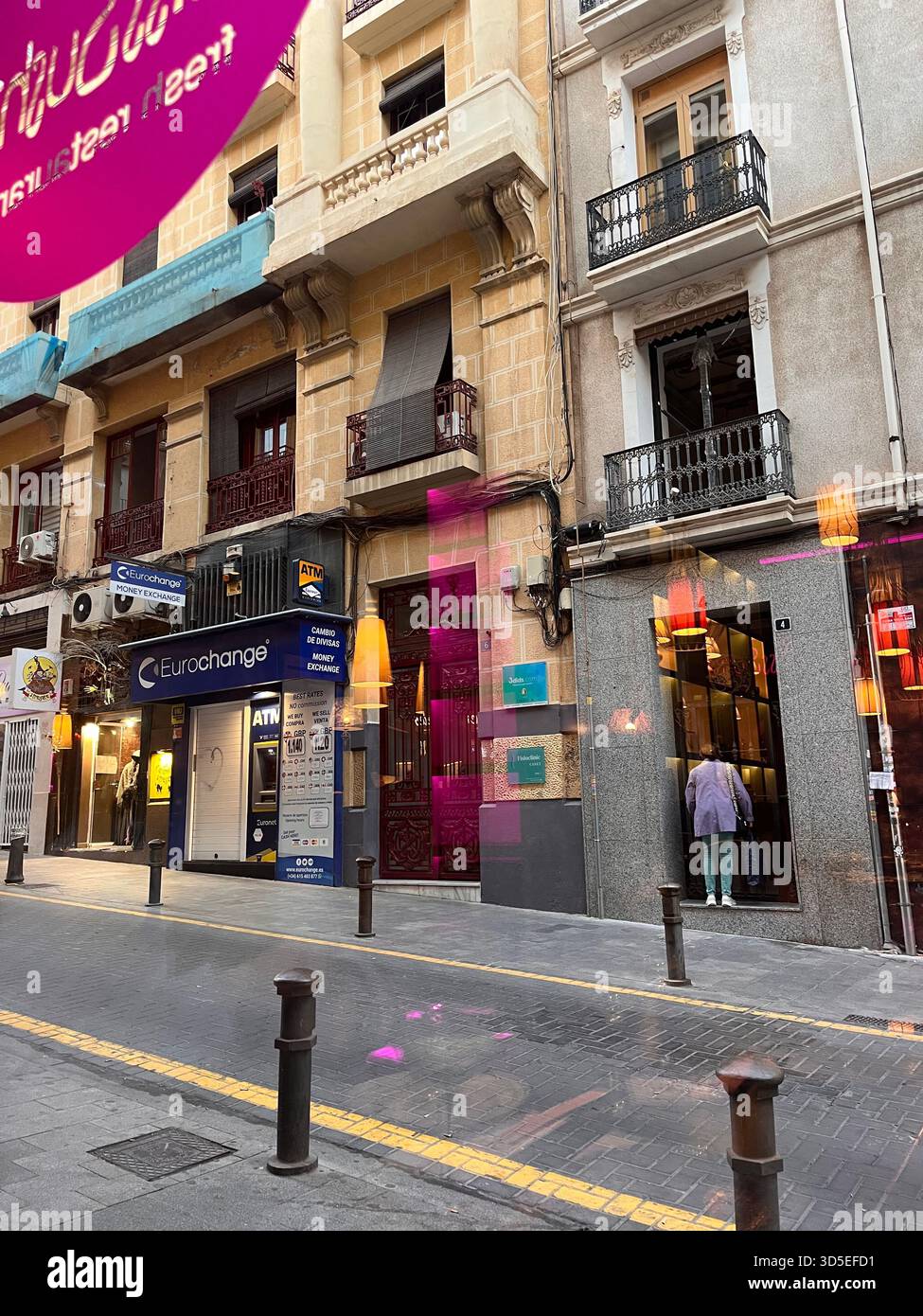 Vibrant street scene in Alicante, Spain, featuring colorful historic ...