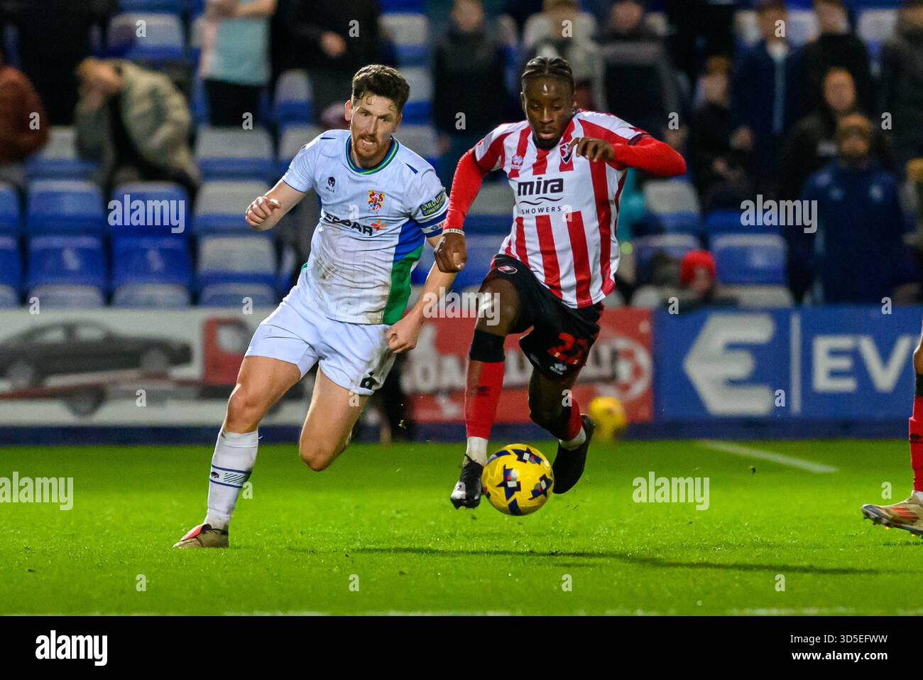 Richard Smallwood of Tranmere Rovers FC tackles Ethon Archer of ...