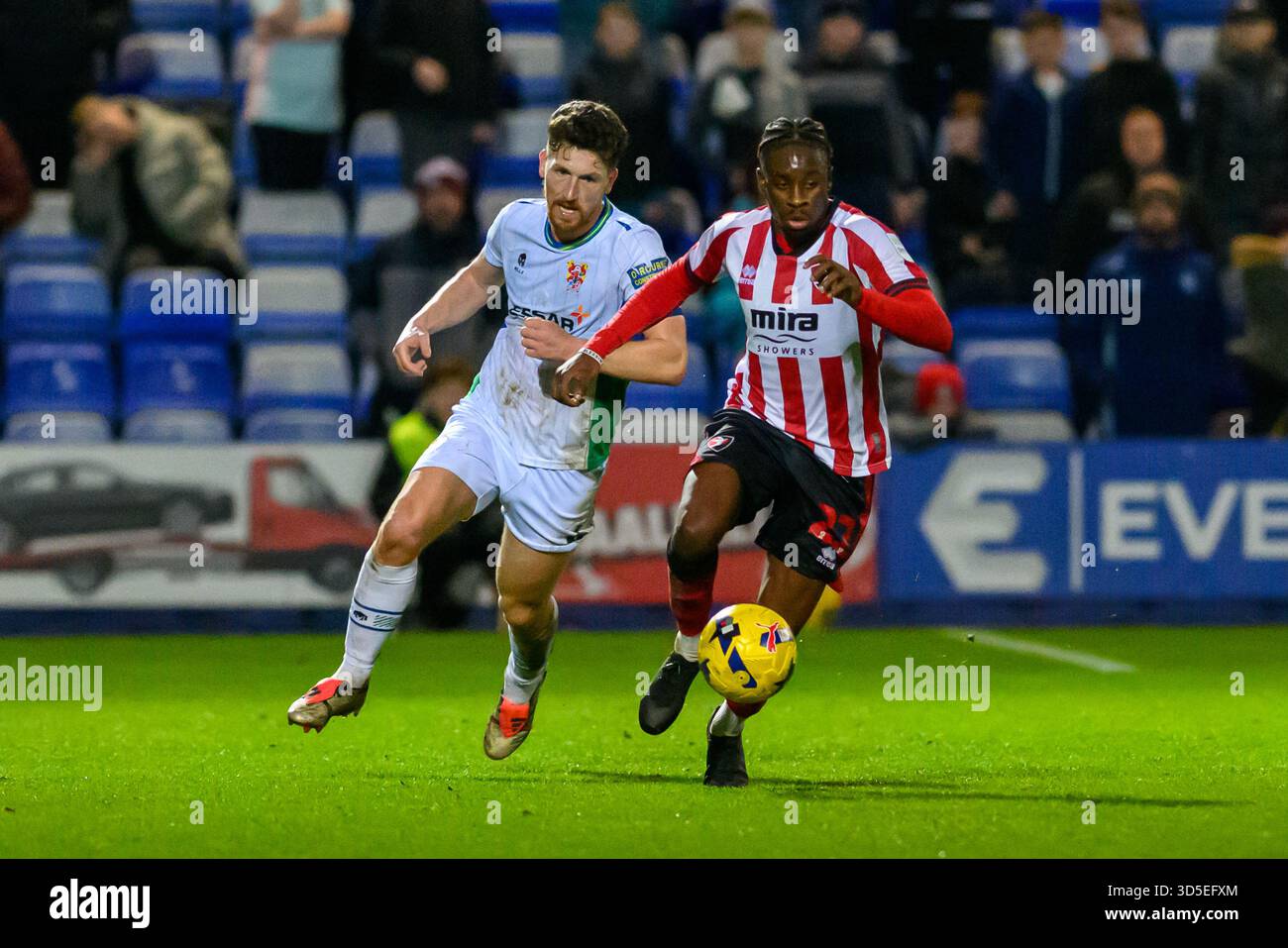 Richard Smallwood of Tranmere Rovers FC tackles Ethon Archer of ...