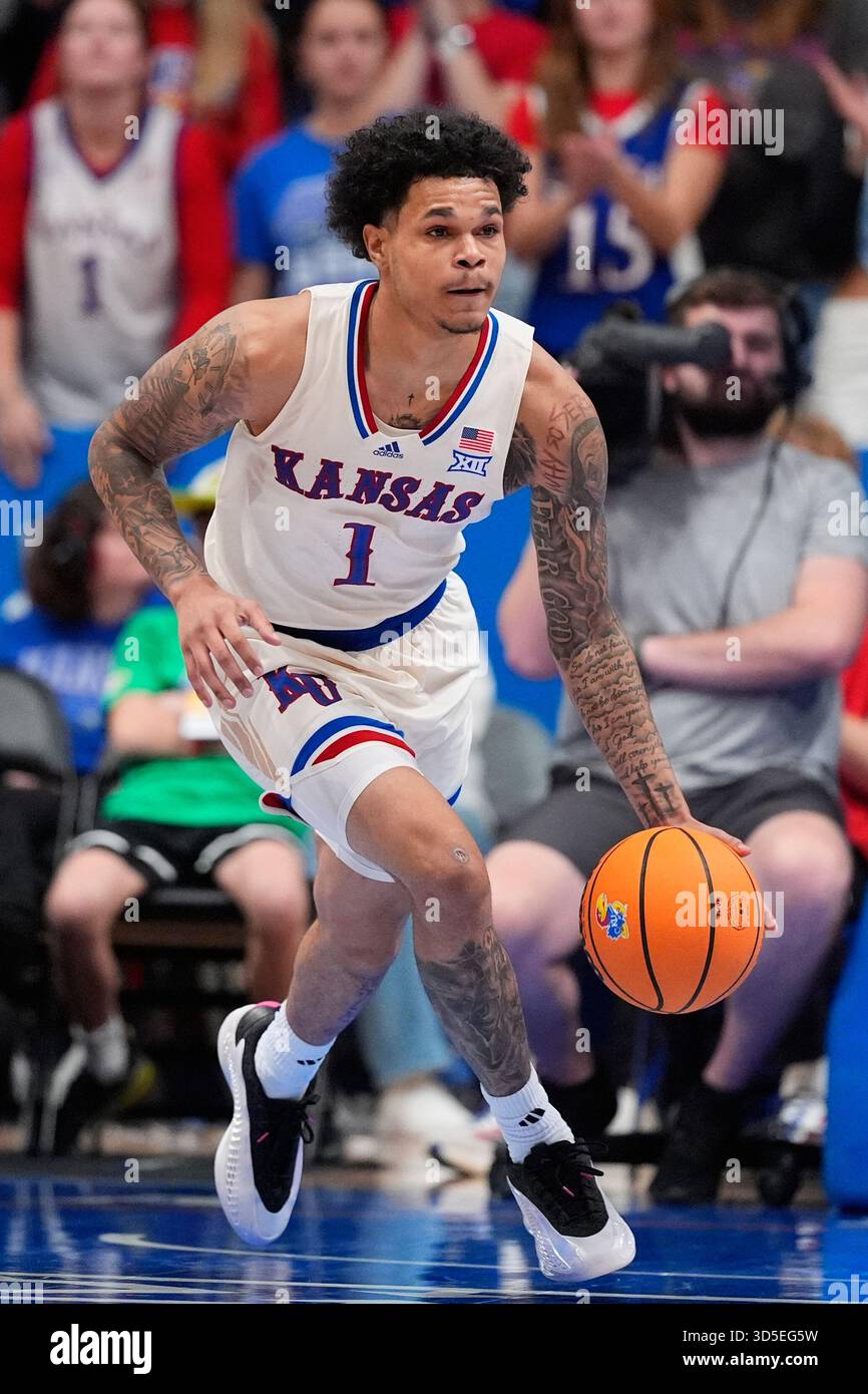 Kansas guard Jayden Dawson drives during the first half of an NCAA ...