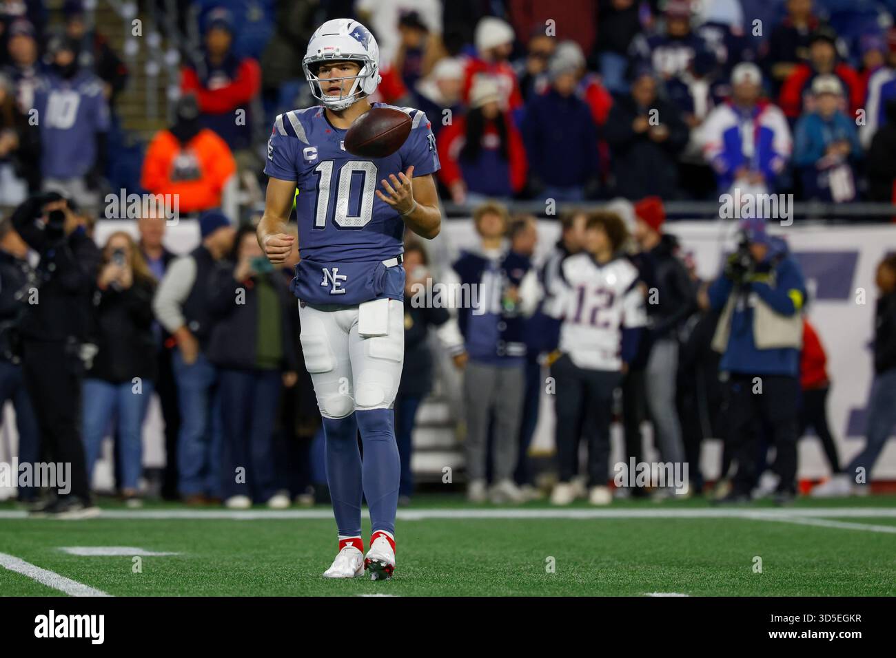 New England Patriots quarterback Drake Maye (10) warms-up prior to the ...