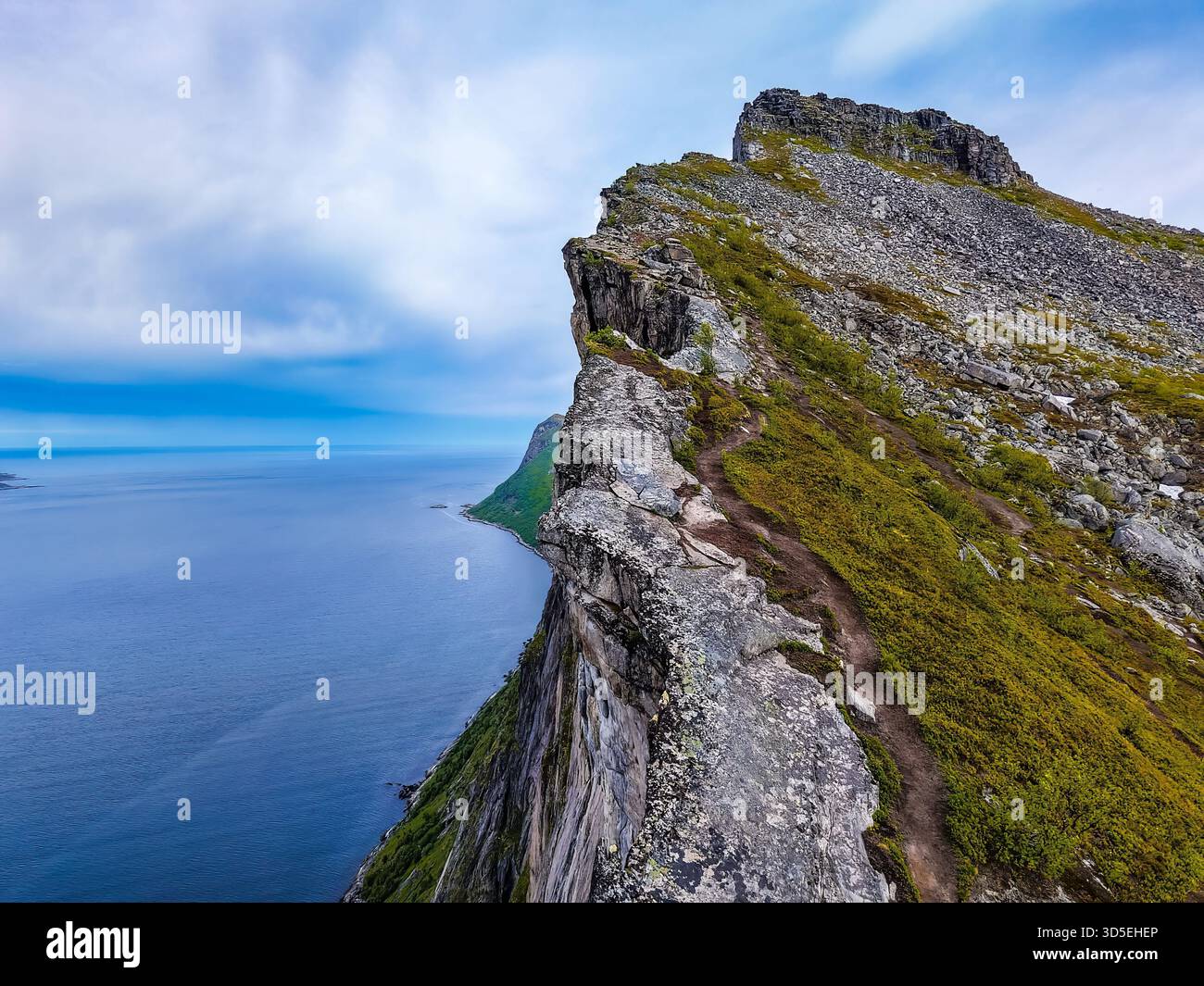 Steep Cliff Trail Above the Arctic Fjords on Senja Island, Norway Stock ...