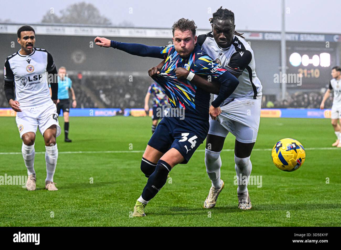 Ben Whitfield (34 Barrow) challenged by Idris Odutayo (30 Bromley ...