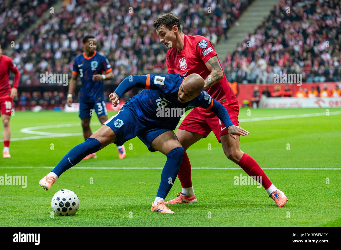 Donyell Malen of Netherlands and Jakub Kiwior of Poland during the FIFA World Cup 2026 European ...