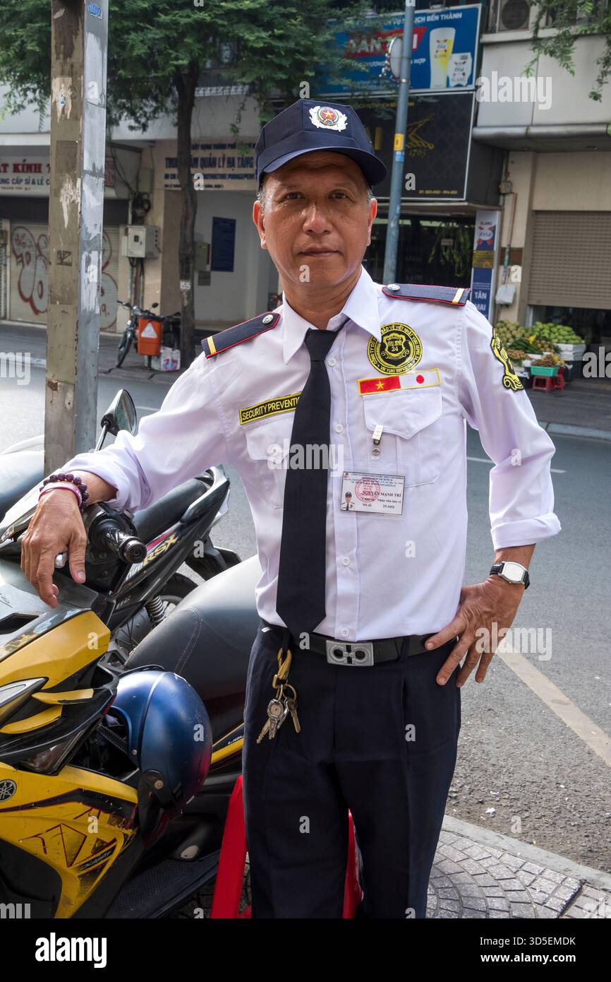 Private security guard in Saigon, Vietnam Stock Photo - Alamy