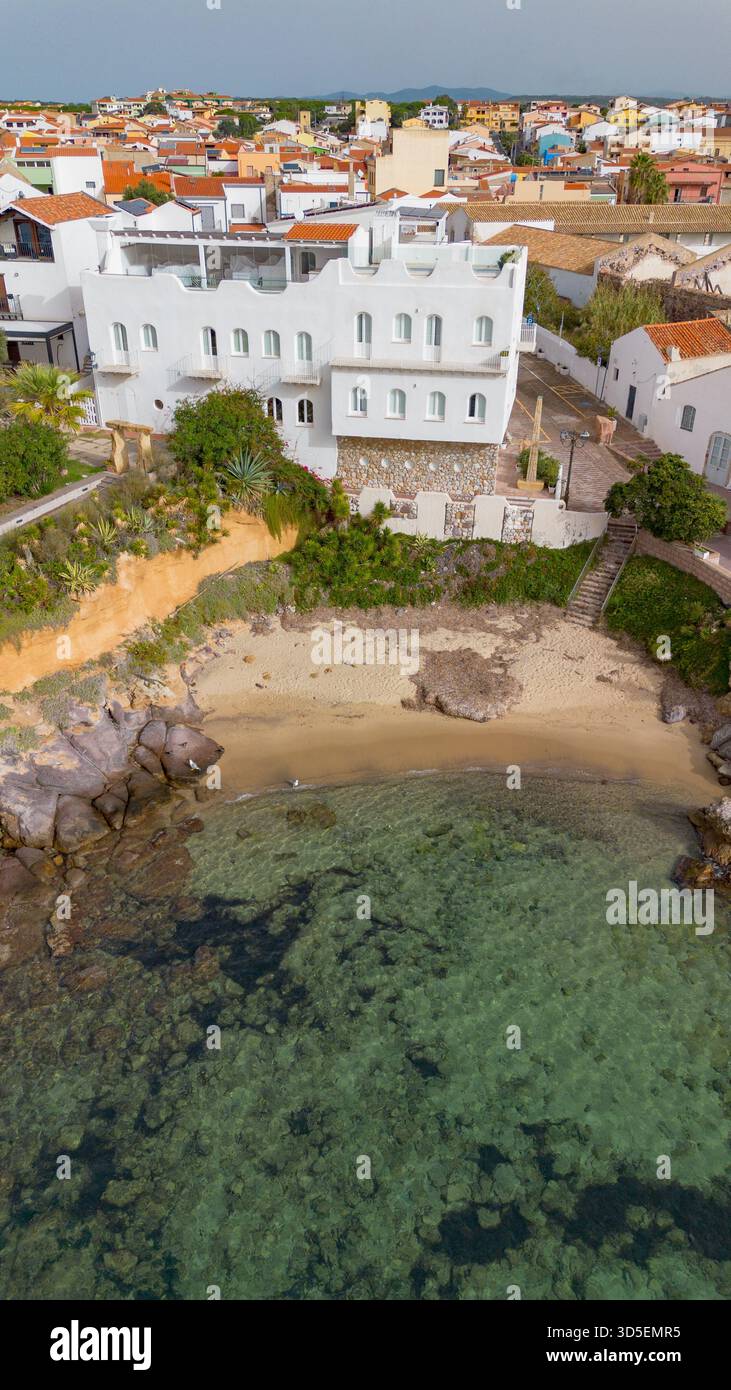 Aerial view of Portoscuso town with colorful rooftops in South Sardinia ...