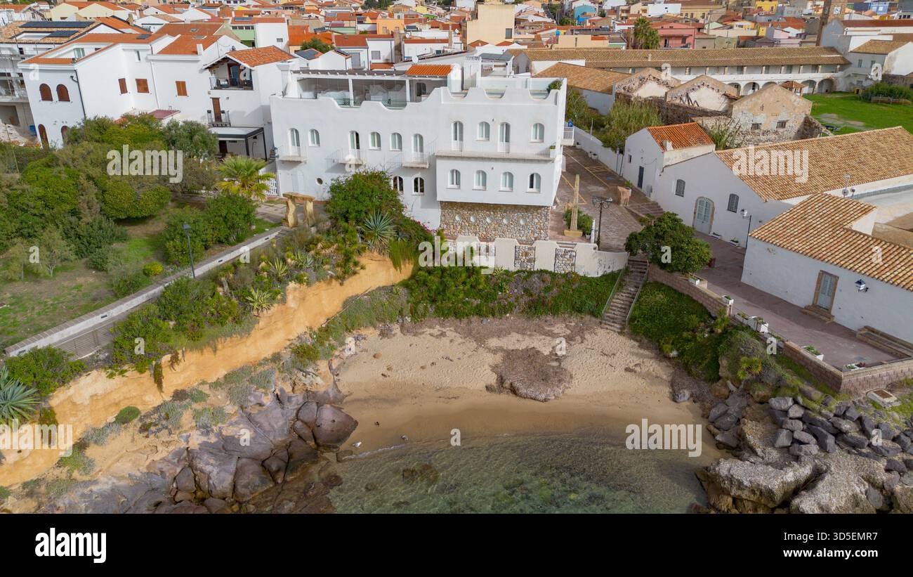 Aerial view of Portoscuso town with colorful rooftops in South Sardinia ...