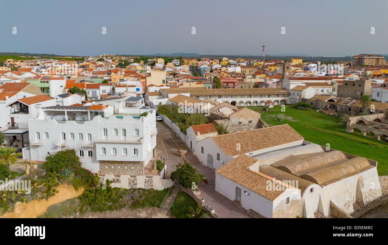 Aerial view of Portoscuso town with colorful rooftops in South Sardinia ...