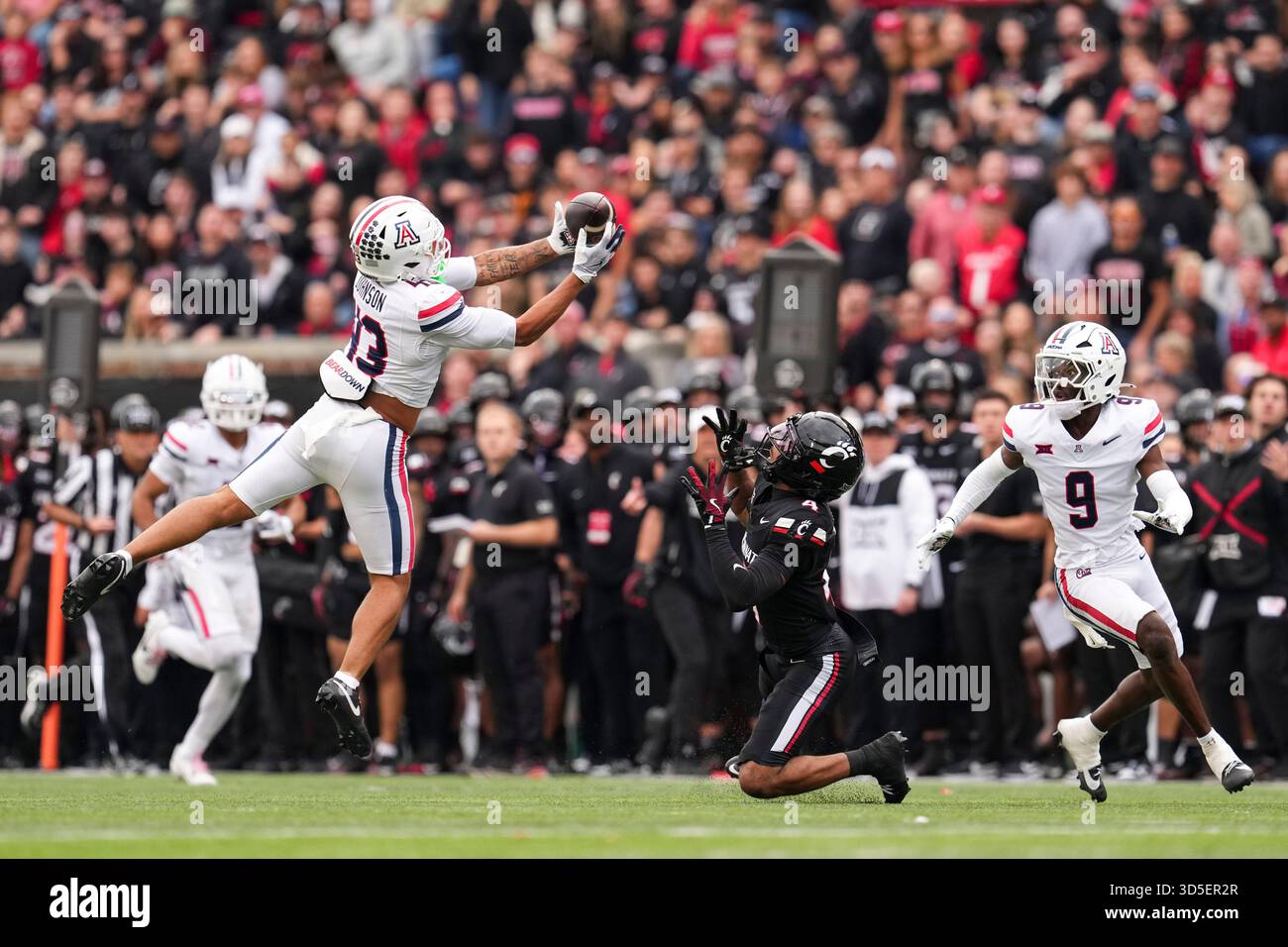 Arizona defensive back Dalton Johnson (43) makes an interception ...