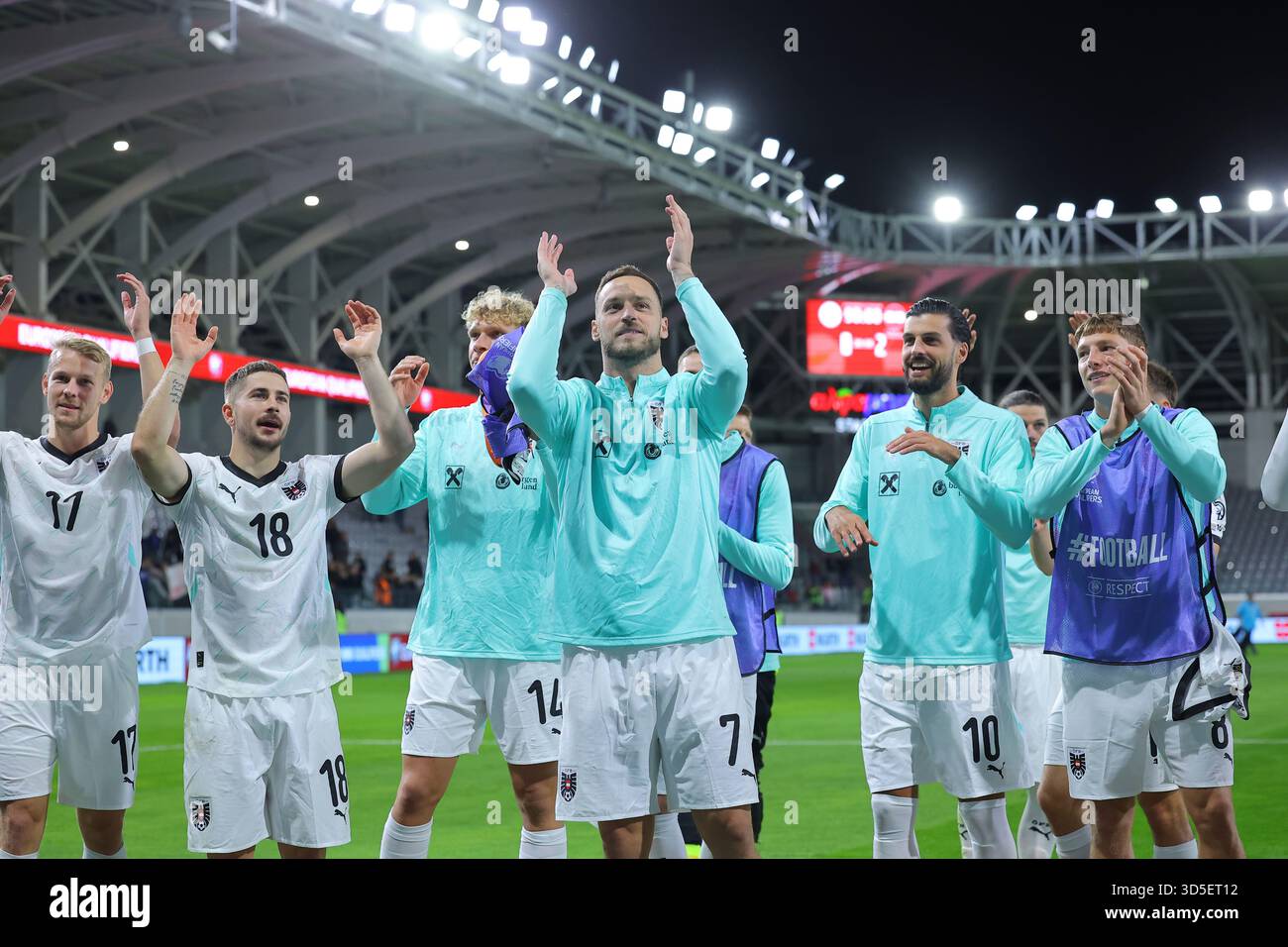 Austria players celebrate after their win for the World Cup 2026 group ...