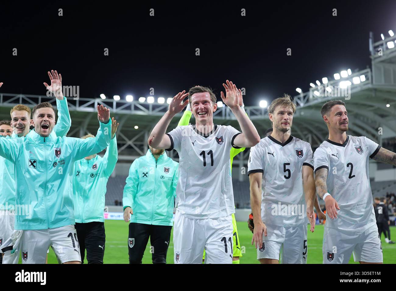 Austria players celebrate after their win for the World Cup 2026 group ...