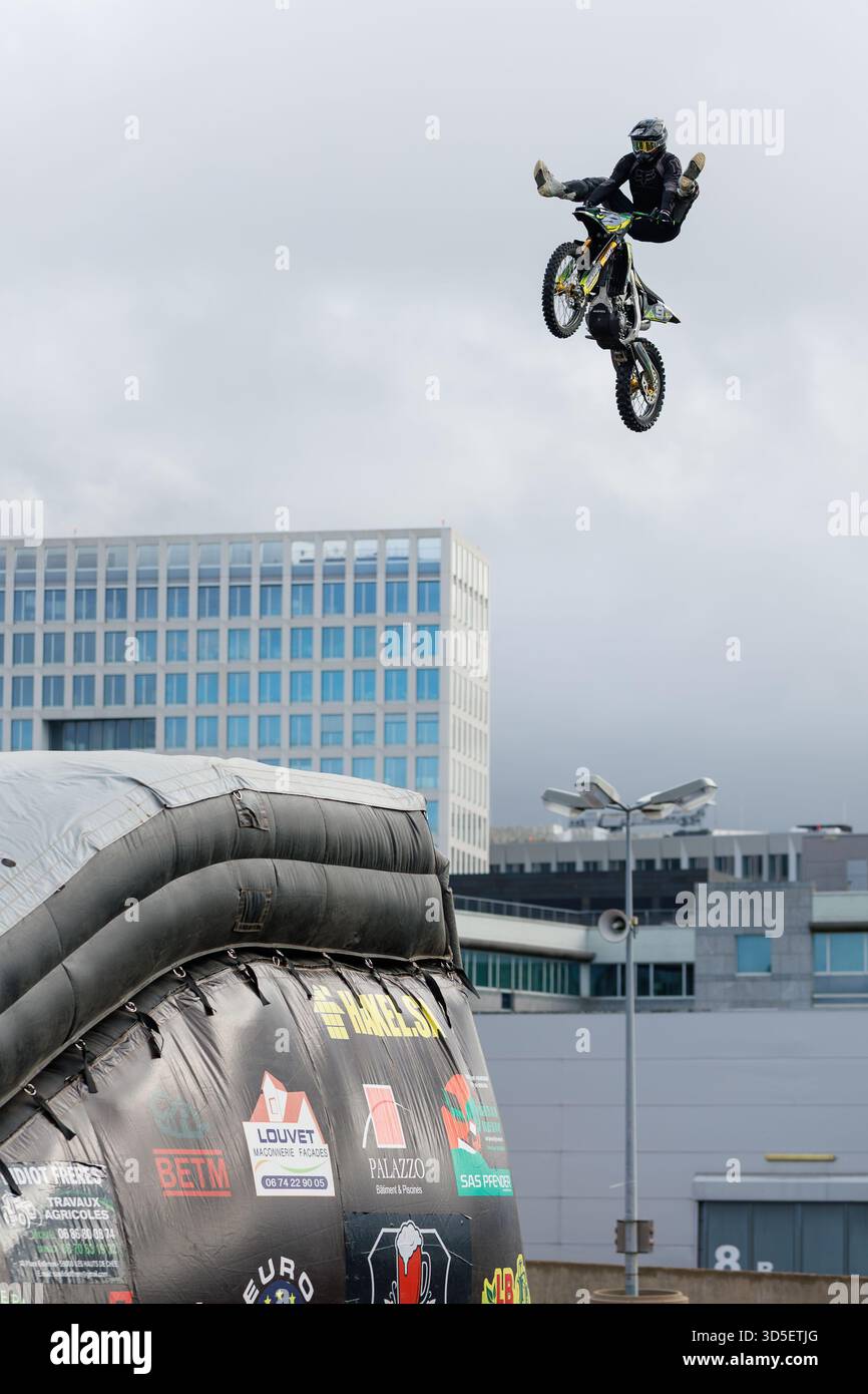 A freestyle motocross rider performs an aerial trick during the Freerid ...