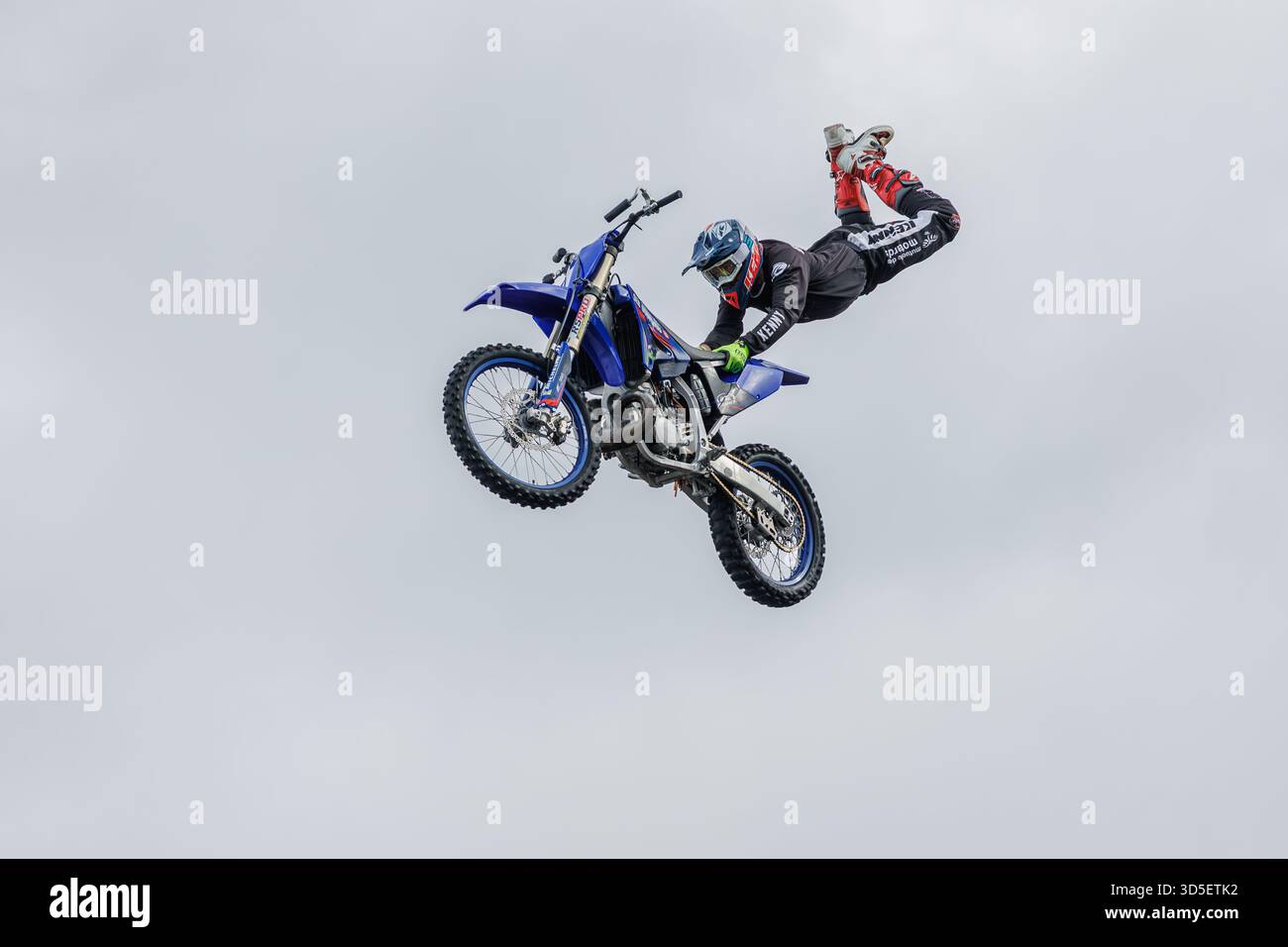 A freestyle motocross rider performs an aerial trick during the Freerid ...