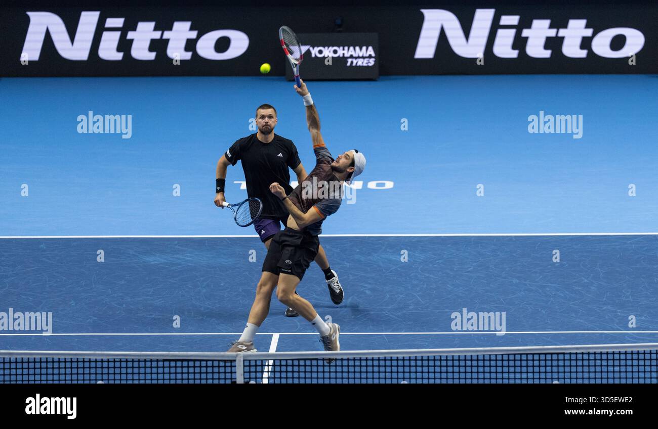Julian Cash and Lloyd Glasspool in action during their semi finals ...