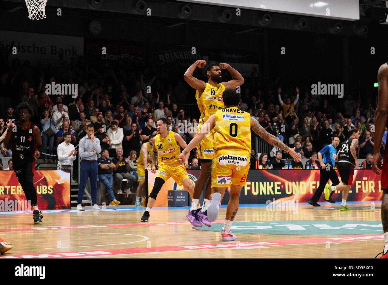 Lucas N Guessan (Phoenix Hagen, #19, Center) celebrates the successful ...