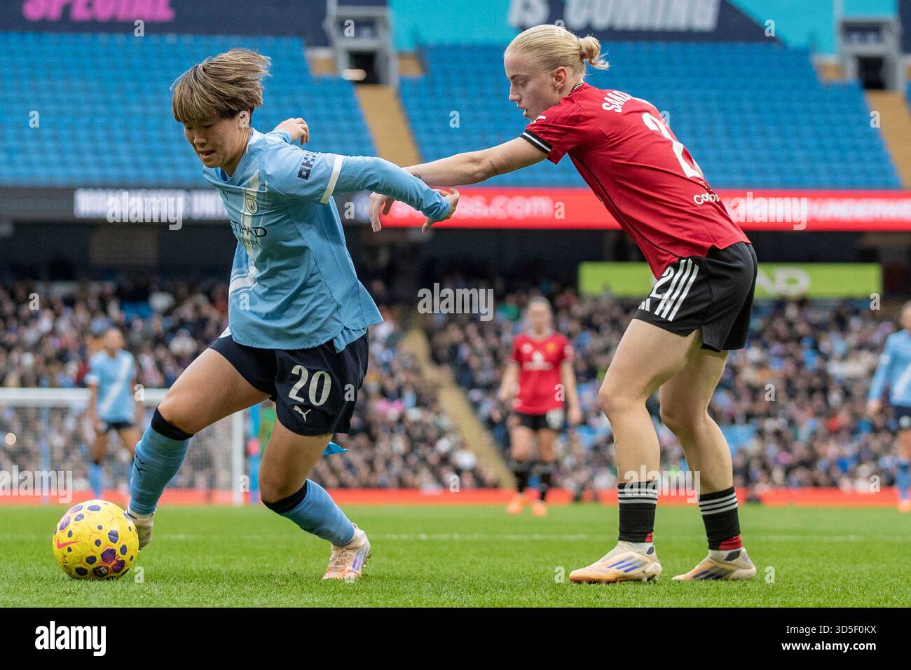 Aoba Fujino of Manchester City tackled by Anna Sandberg #2 of ...