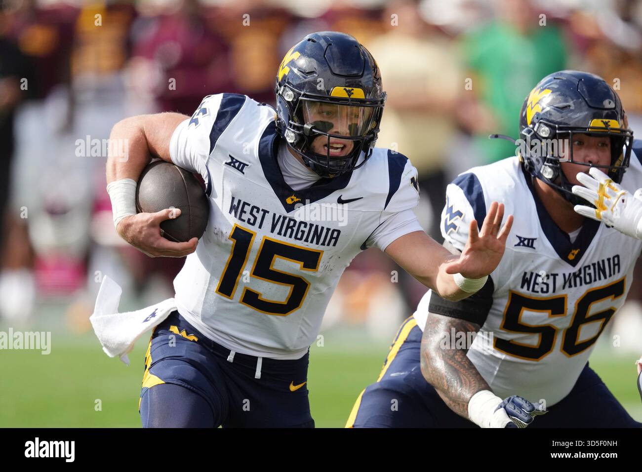 West Virginia quarterback Scotty Fox Jr. runs with the ball against ...