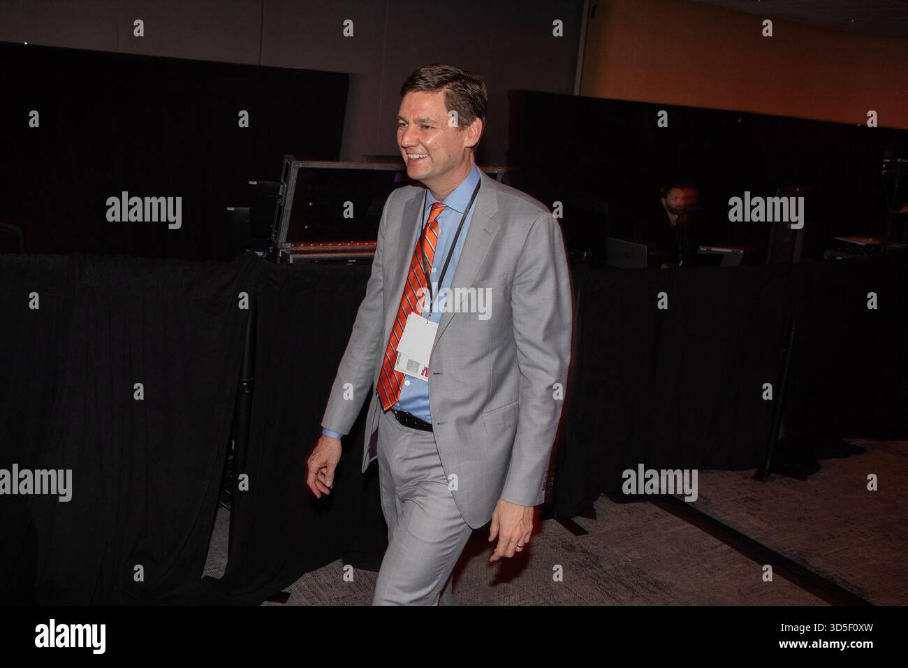 Premier David Eby walks the room during the biennial B.C. NDP ...