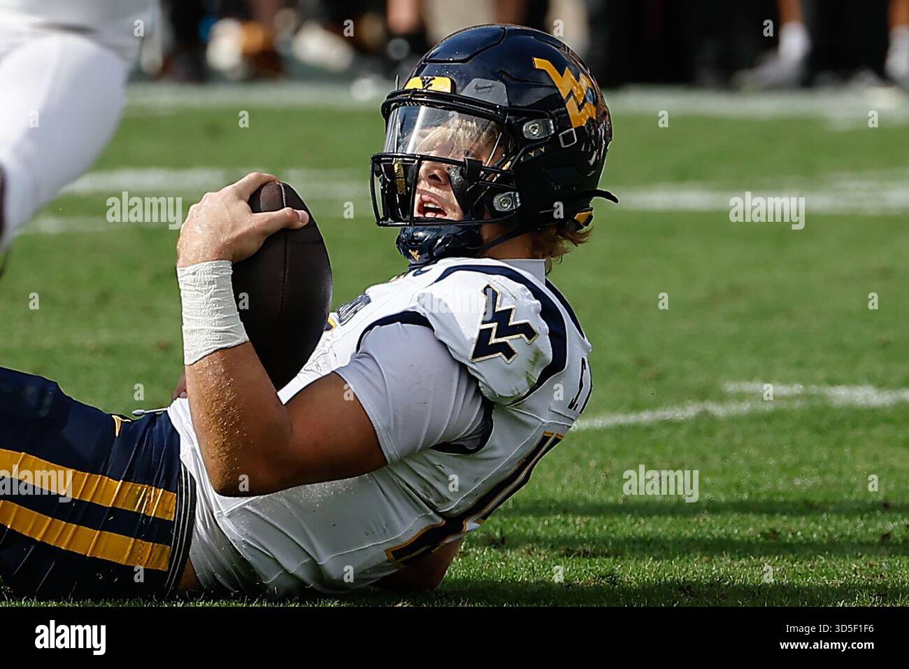 TEMPE, AZ - NOVEMBER 15: West Virginia Mountaineers quarterback Scotty ...
