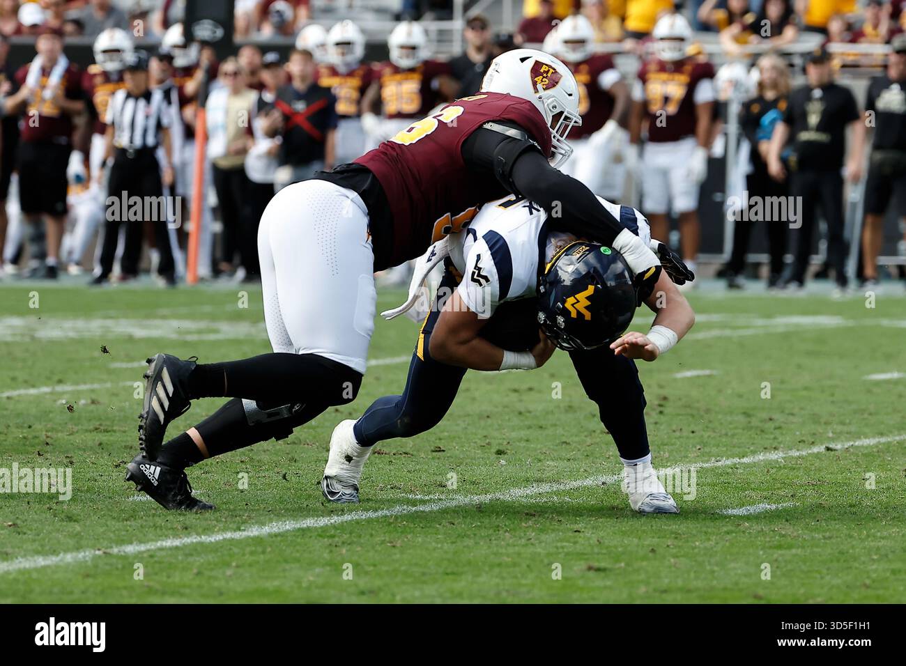 TEMPE, AZ - NOVEMBER 15: West Virginia Mountaineers quarterback Scotty ...