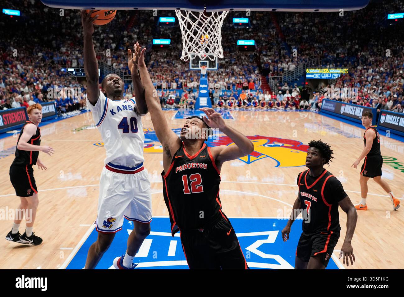 Kansas forward Flory Bidunga (40) shoots over Princeton forward Jacob ...