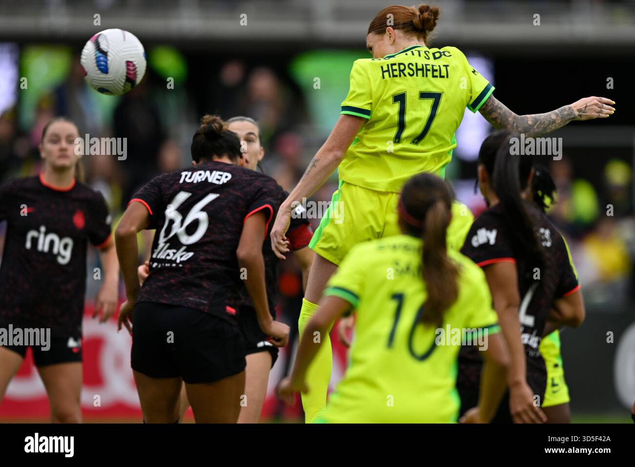 Washington Spirit midfielder Hal Hershfelt (17) heads the ball towards ...