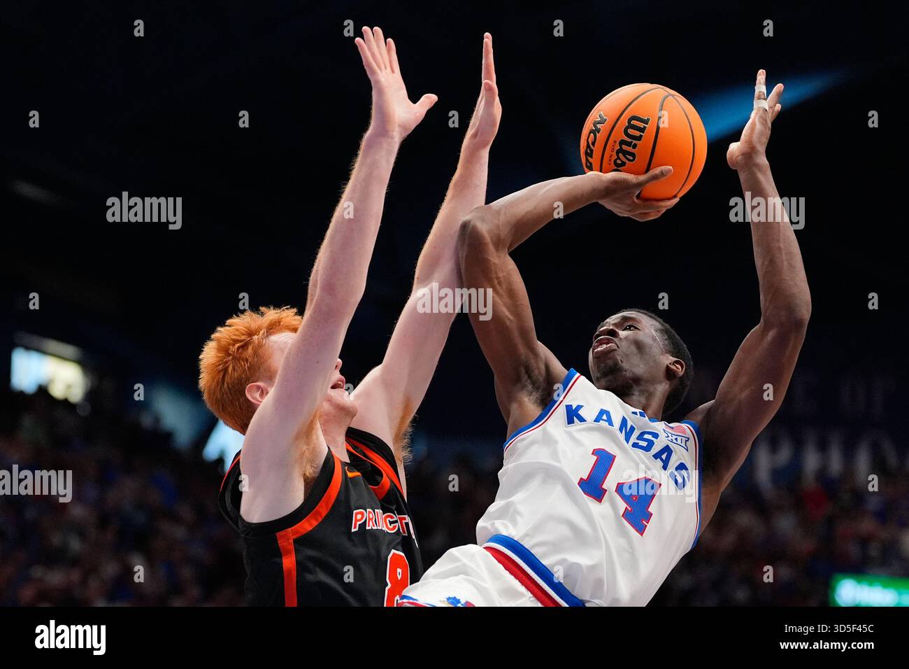 Kansas guard Melvin Council Jr. (14) shoots over Princeton guard Landon ...