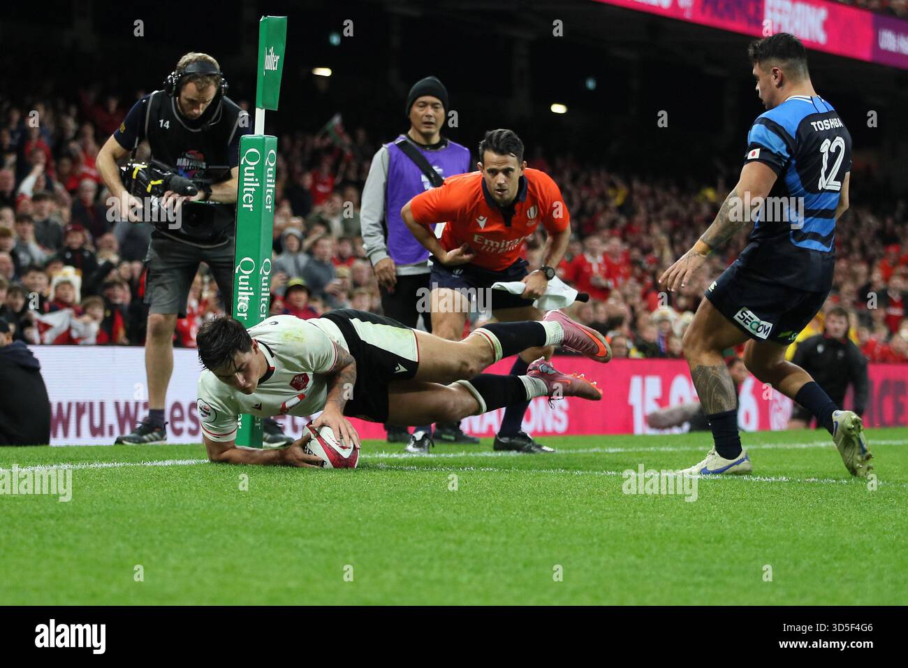Louis Rees-Zammit of Wales dives over to score his teams 2nd try in the 2nd half. Wales v Japan ...