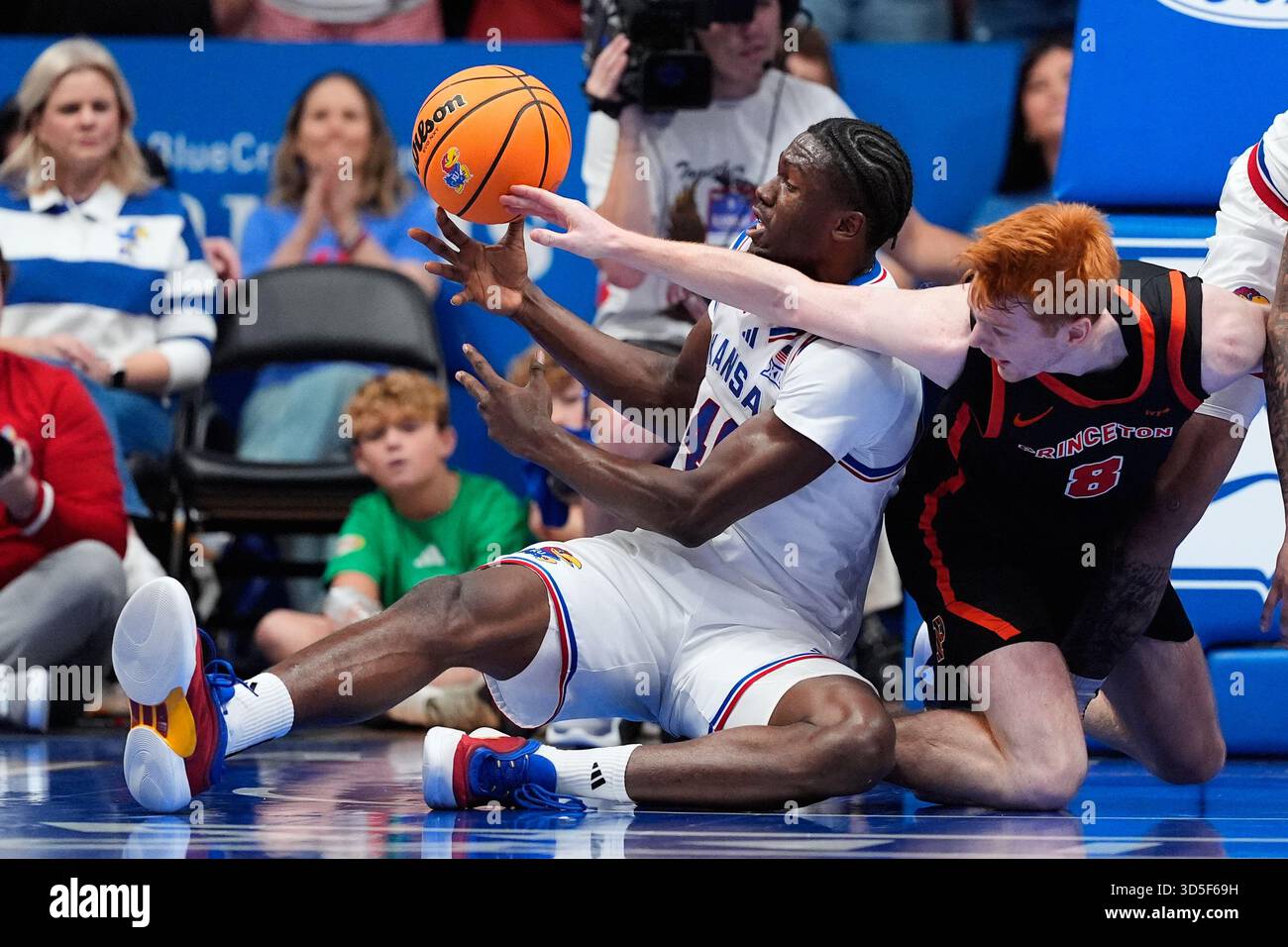 Princeton guard Landon Clark (8) tries to knock the ball away from ...